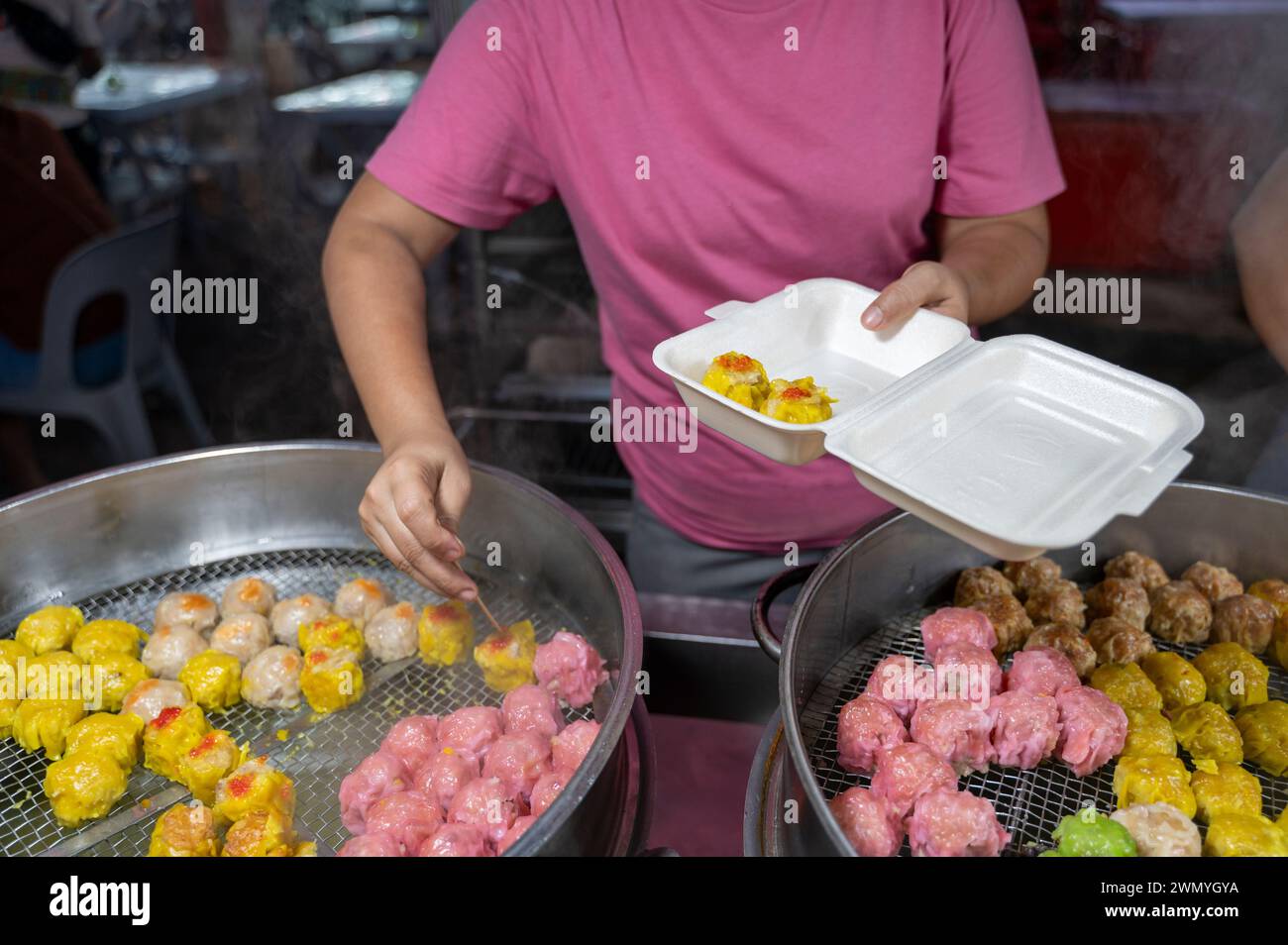 Sidewalk food stall serving local hi-res stock photography and images ...