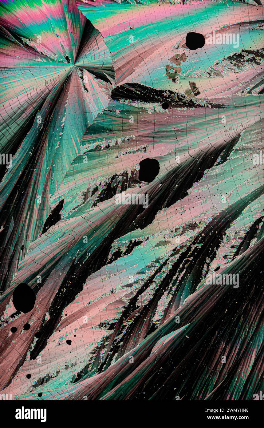 Abstract crystal texture with vibrant pink and green hues, interspersed ...