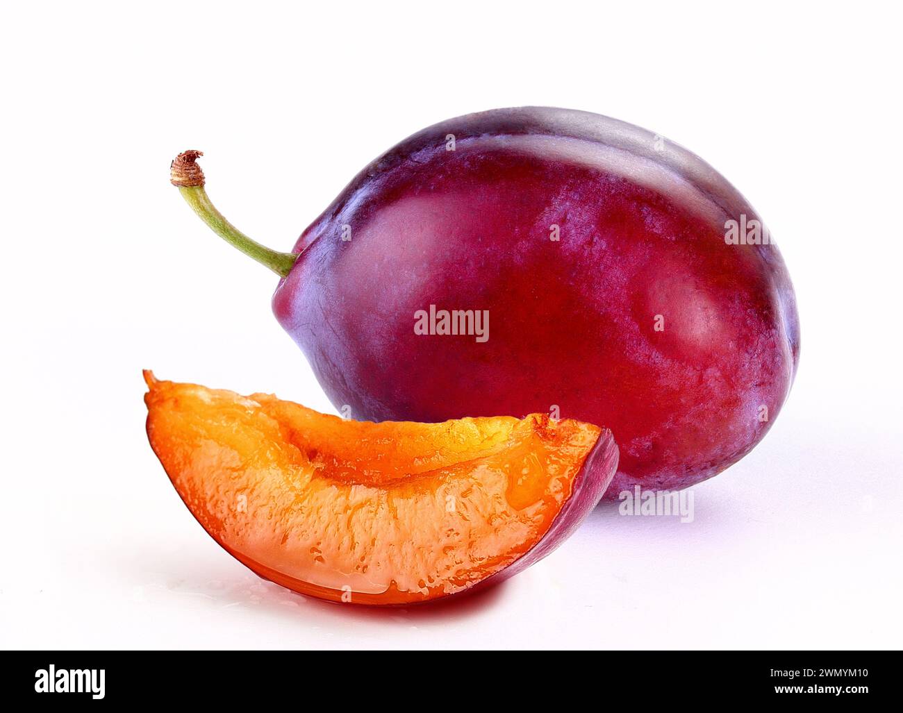 plum with leaf isolated white background Stock Photo - Alamy