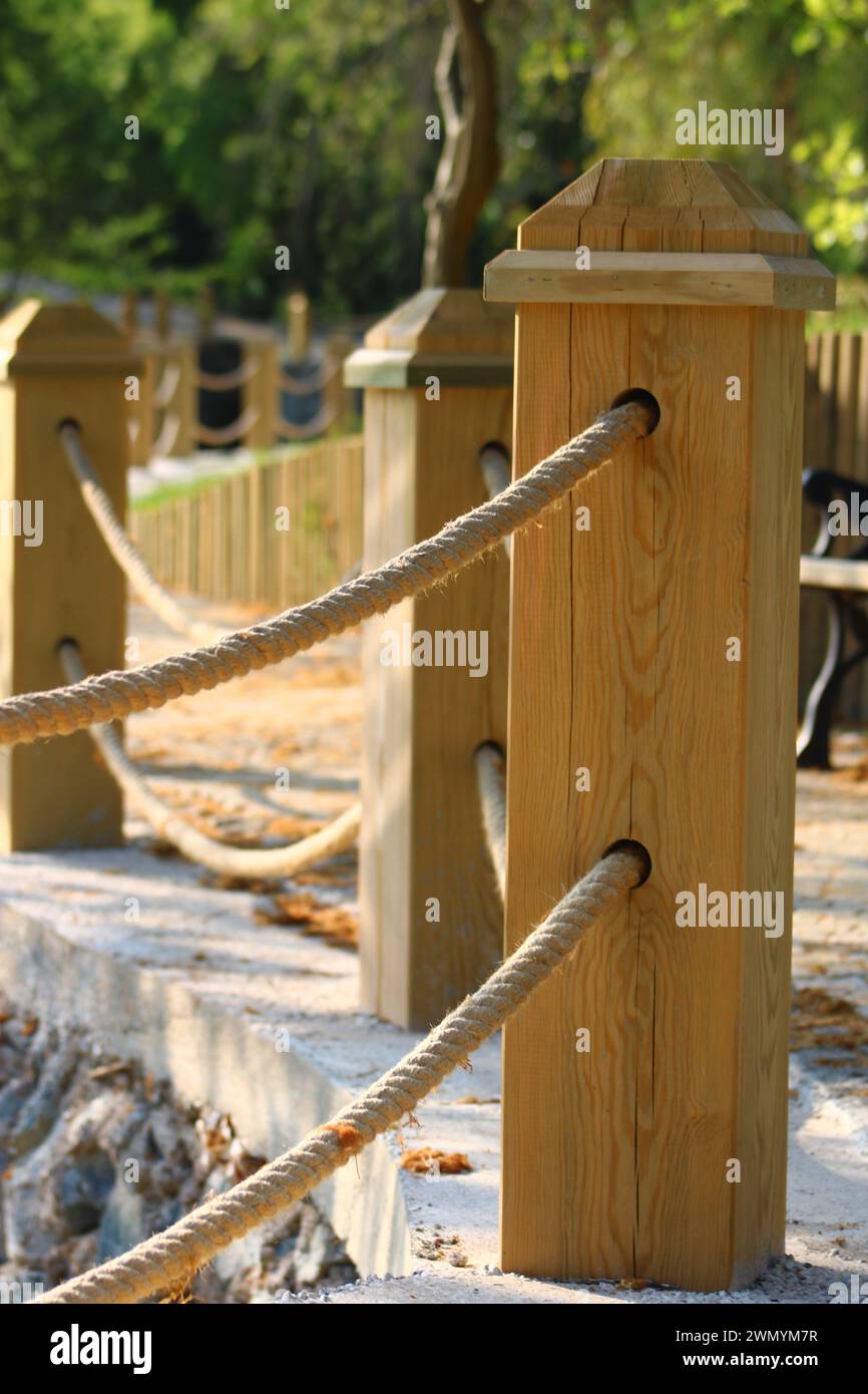 rope railing made of wood. wooden fence Stock Photo - Alamy