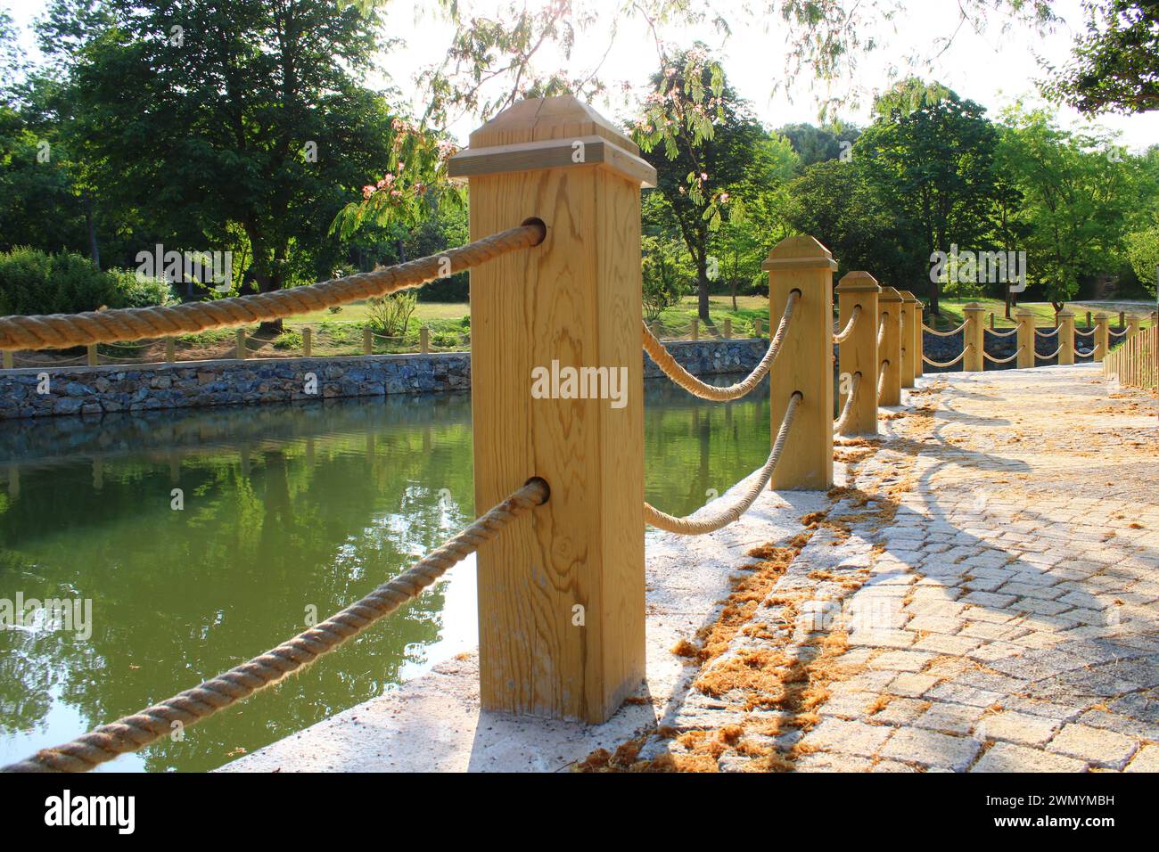 rope railing made of wood. wooden fence Stock Photo - Alamy