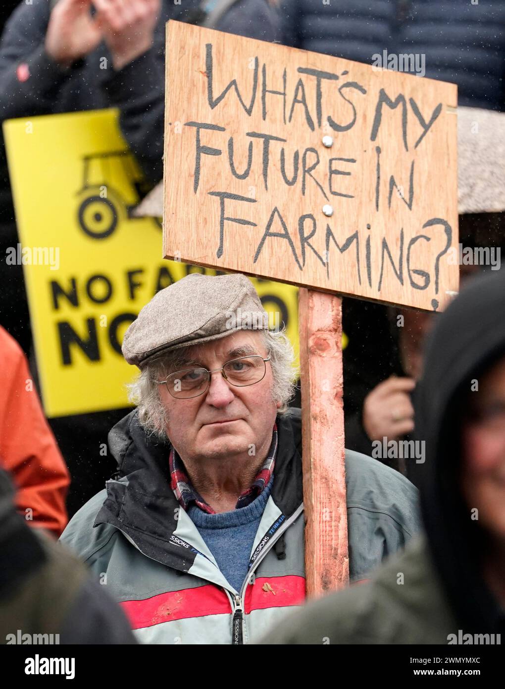 Members of the farming community protest outside the Senedd in Cardiff ...
