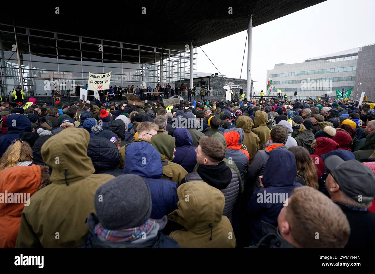 Members of the farming community protest outside the Senedd in Cardiff ...