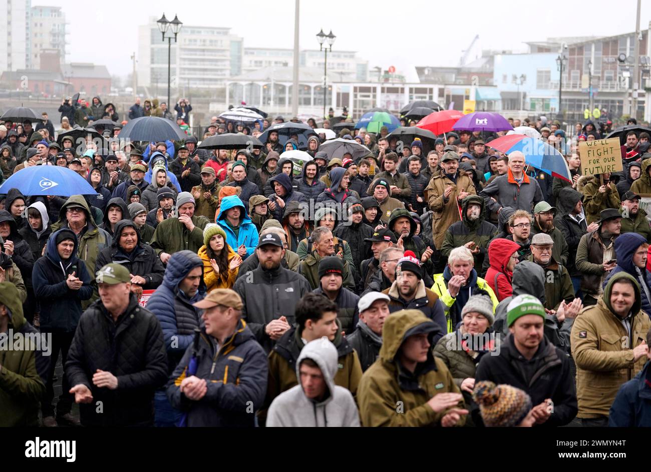 Members of the farming community protest outside the Senedd in Cardiff ...