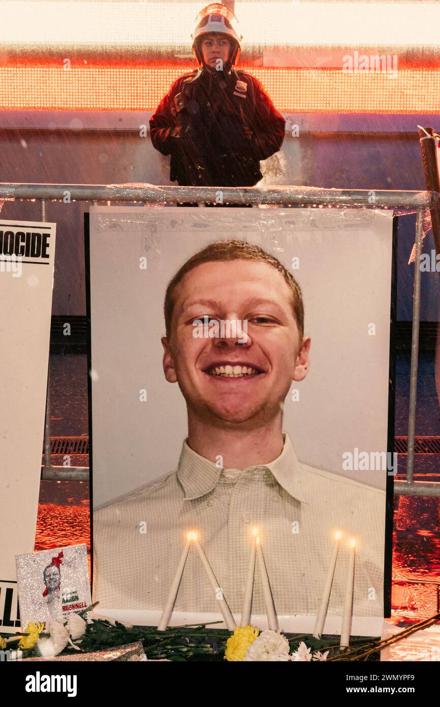 People hold a vigil for Aaron Bushnell, a 25-year-old service member of ...