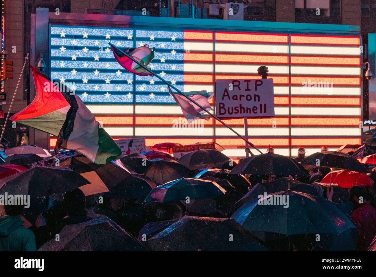 People hold a vigil for Aaron Bushnell, a 25-year-old service member of ...