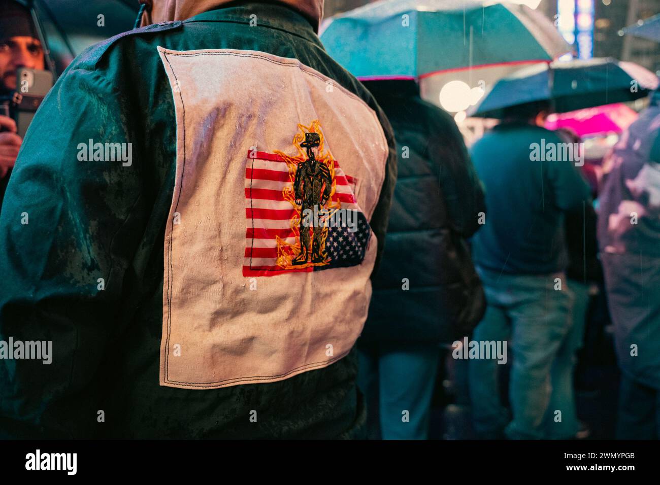 People hold a vigil for Aaron Bushnell, a 25-year-old service member of ...