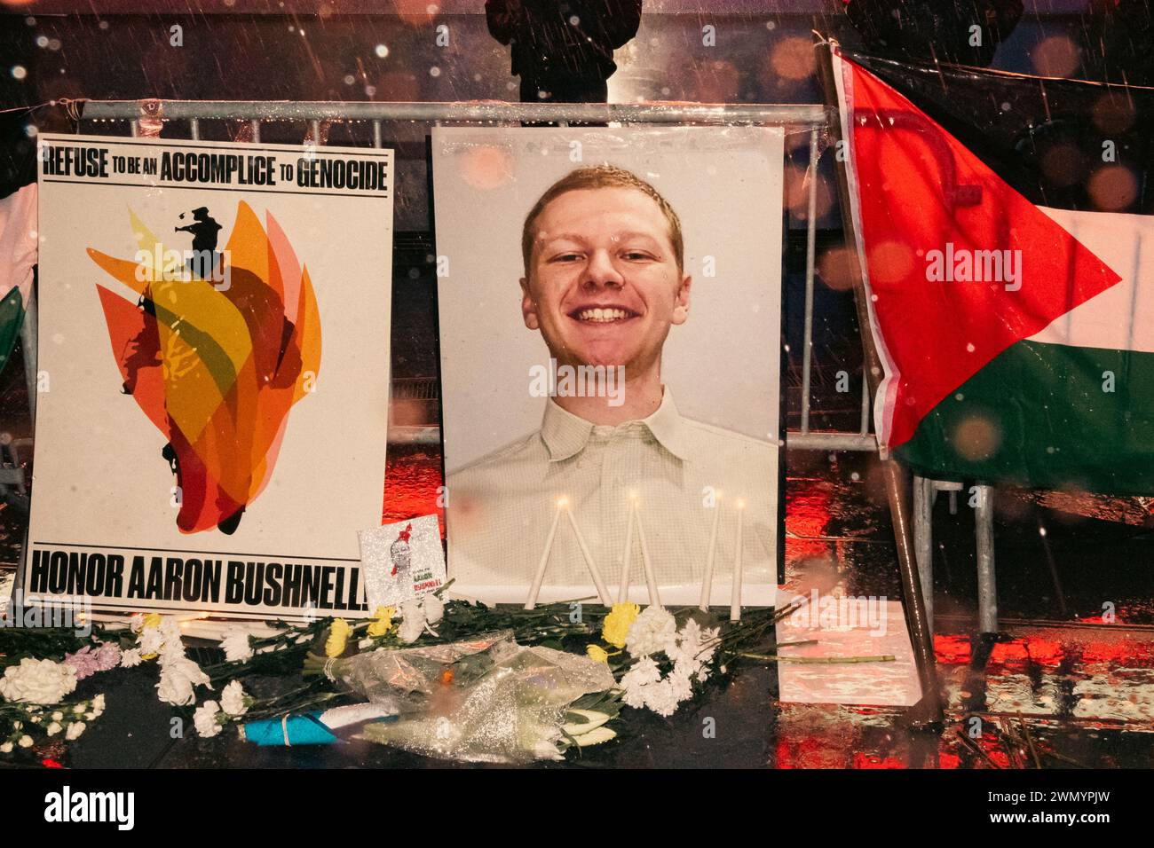 People hold a vigil for Aaron Bushnell, a 25-year-old service member of ...