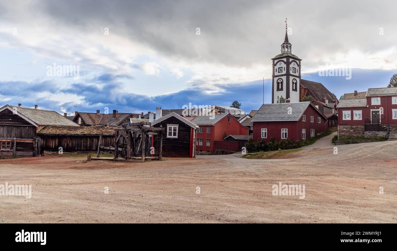 Panoramic scene in Roros with the old mine elevator and iconic red ...