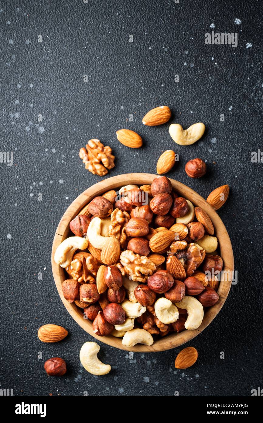 Nuts assortment at black background Stock Photo - Alamy