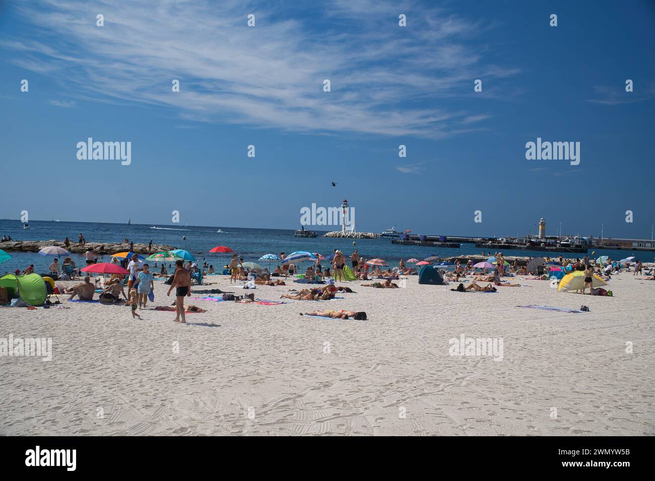 Cannes, France- August 3,2021: Crowd relaxing on the famous Plage des ...