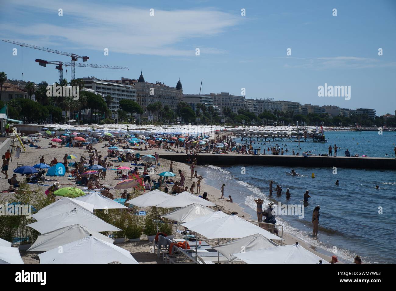 Cannes, France- August 3,2021: Crowd relaxing on the famous Plage des ...