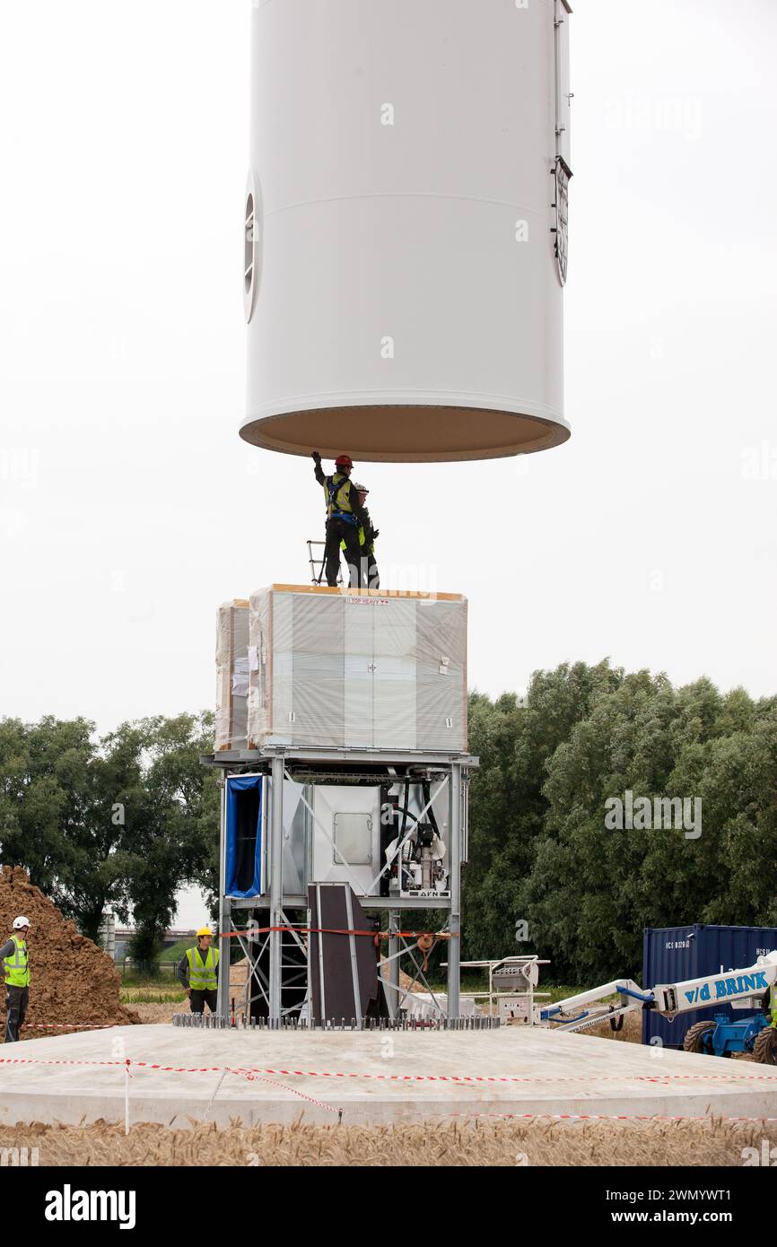 Installation of wind turbines in Ressen- Lifting a wind tower in Ressen ...