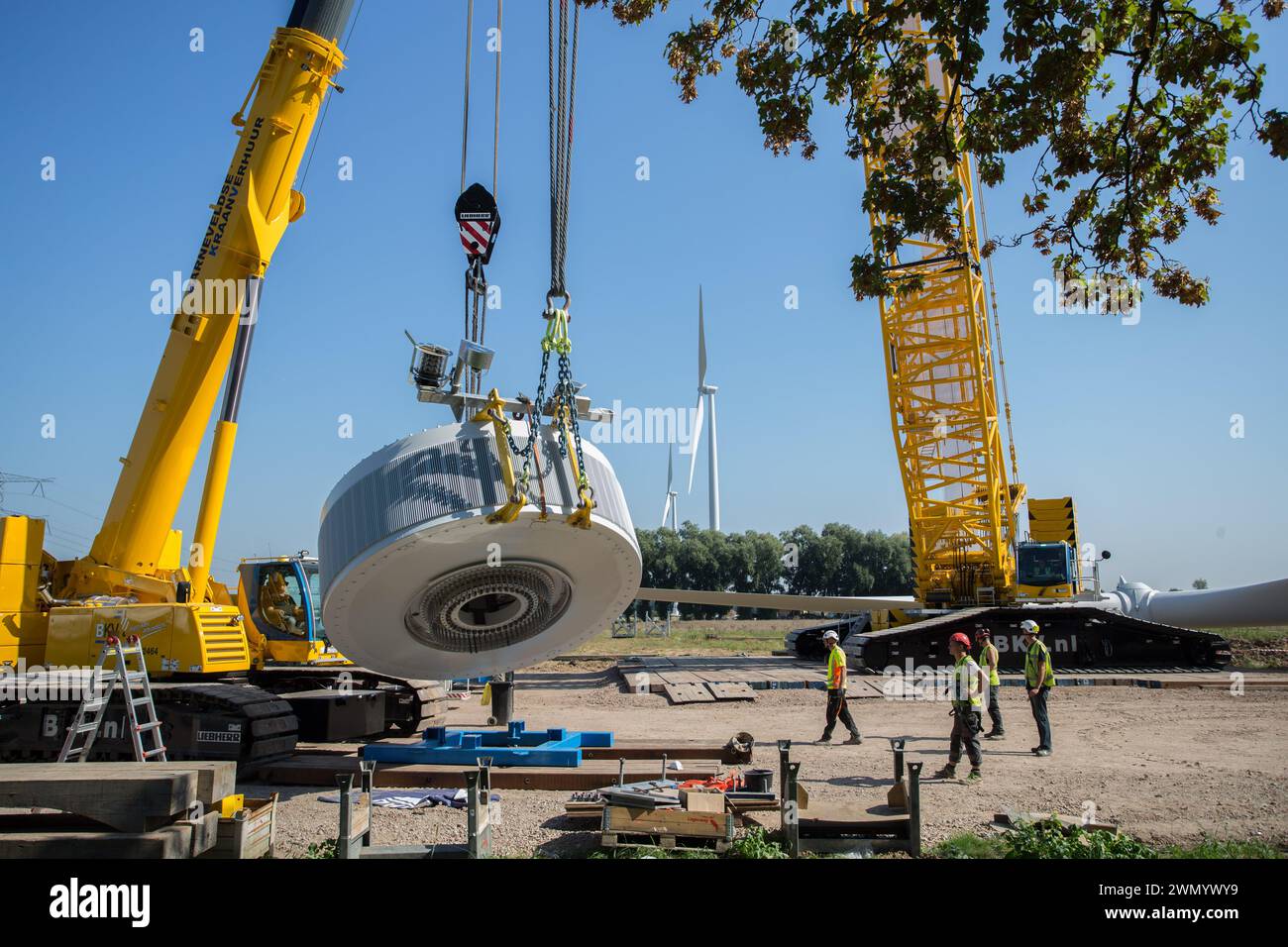 Installation of wind turbines in Ressen- Lifting a wind generator in ...