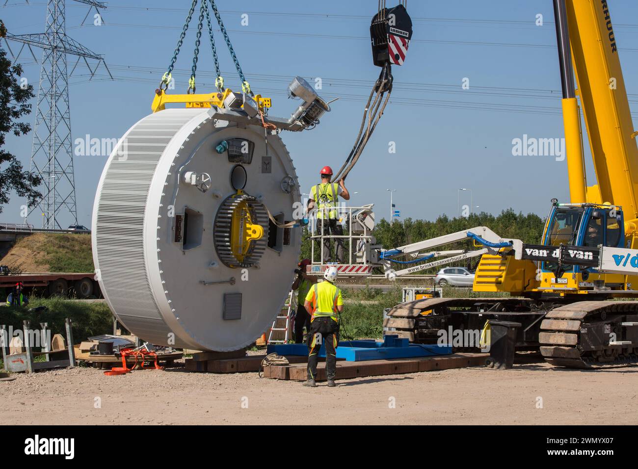 Installation of wind turbines in Ressen- Lifting a wind generator in ...