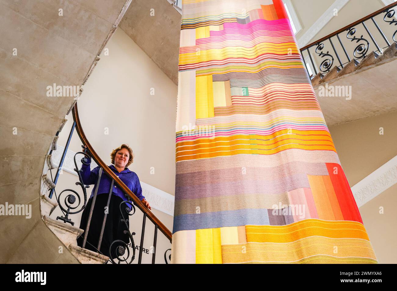 London, UK. 28th Feb, 2024. Textile artist Margo Selby (left) with the ...