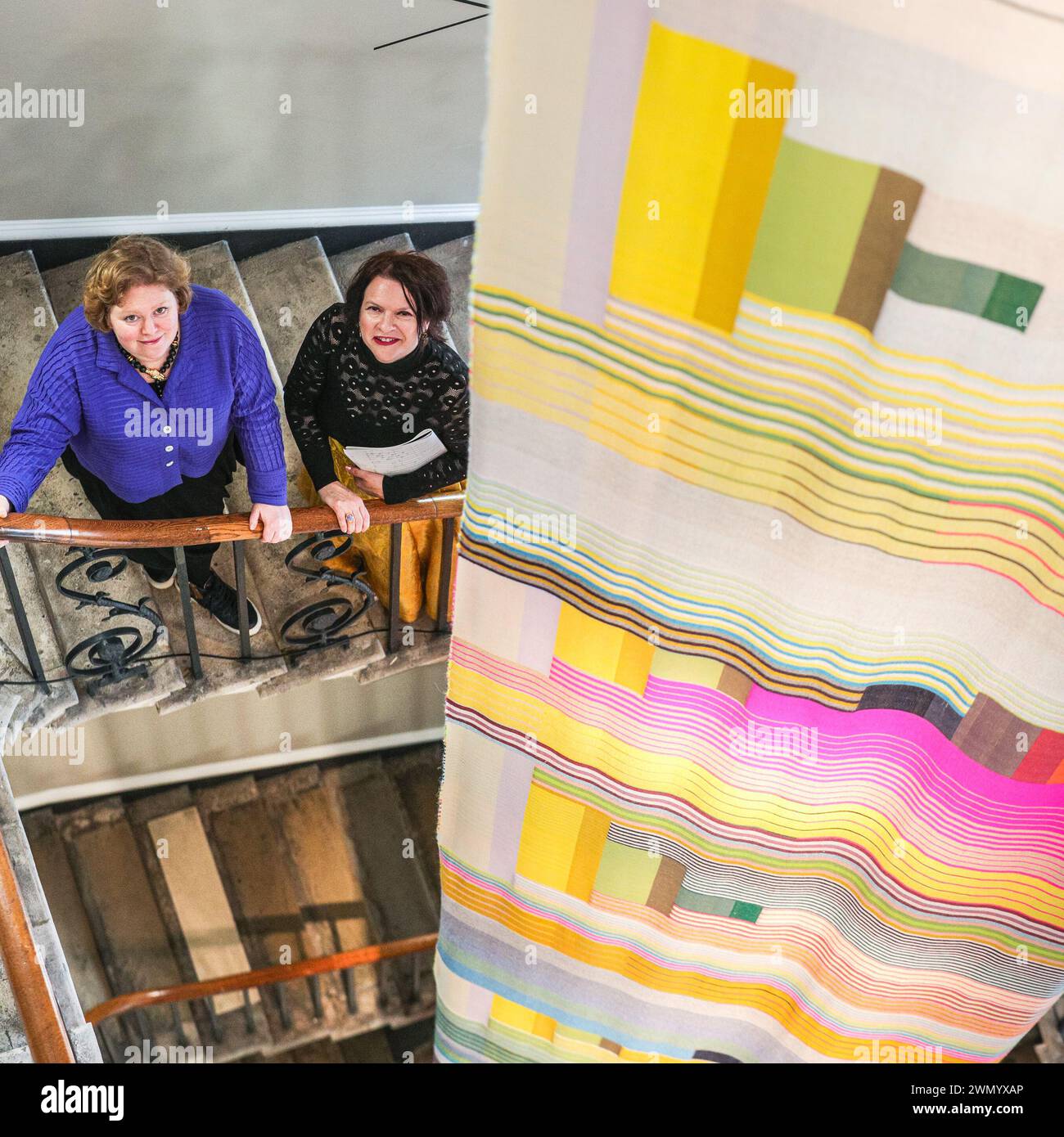 London, UK. 28th Feb, 2024. Textile artist Margo Selby (left) with ...