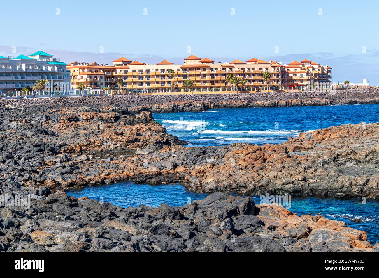 Holiday apartments beside the volcanic Caleta del Espino beach at ...