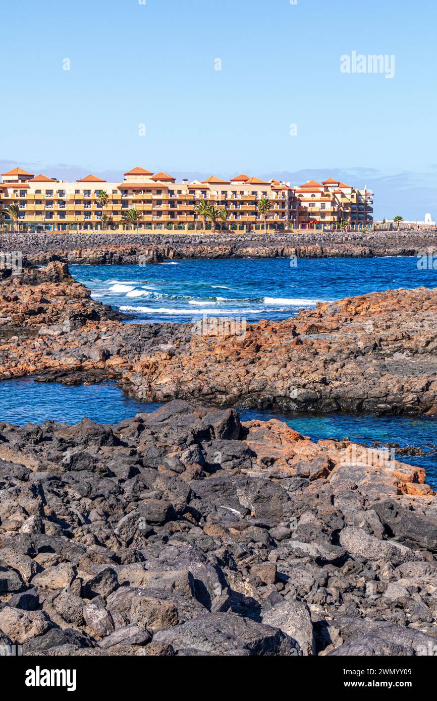 Holiday apartments beside the volcanic Caleta del Espino beach at ...