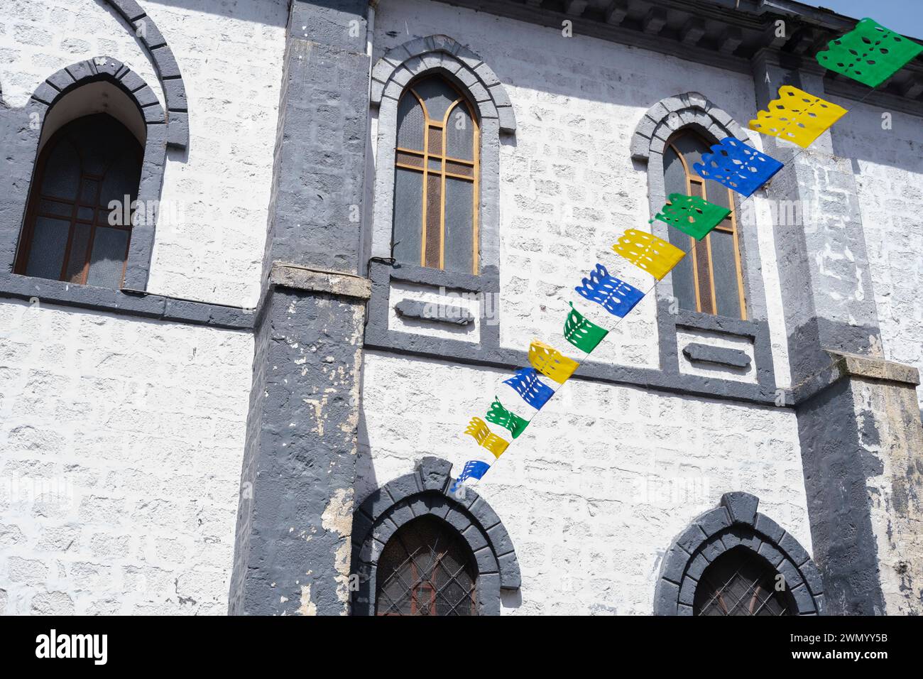 Typical paper street decorations in blue and yellow colors Stock Photo ...