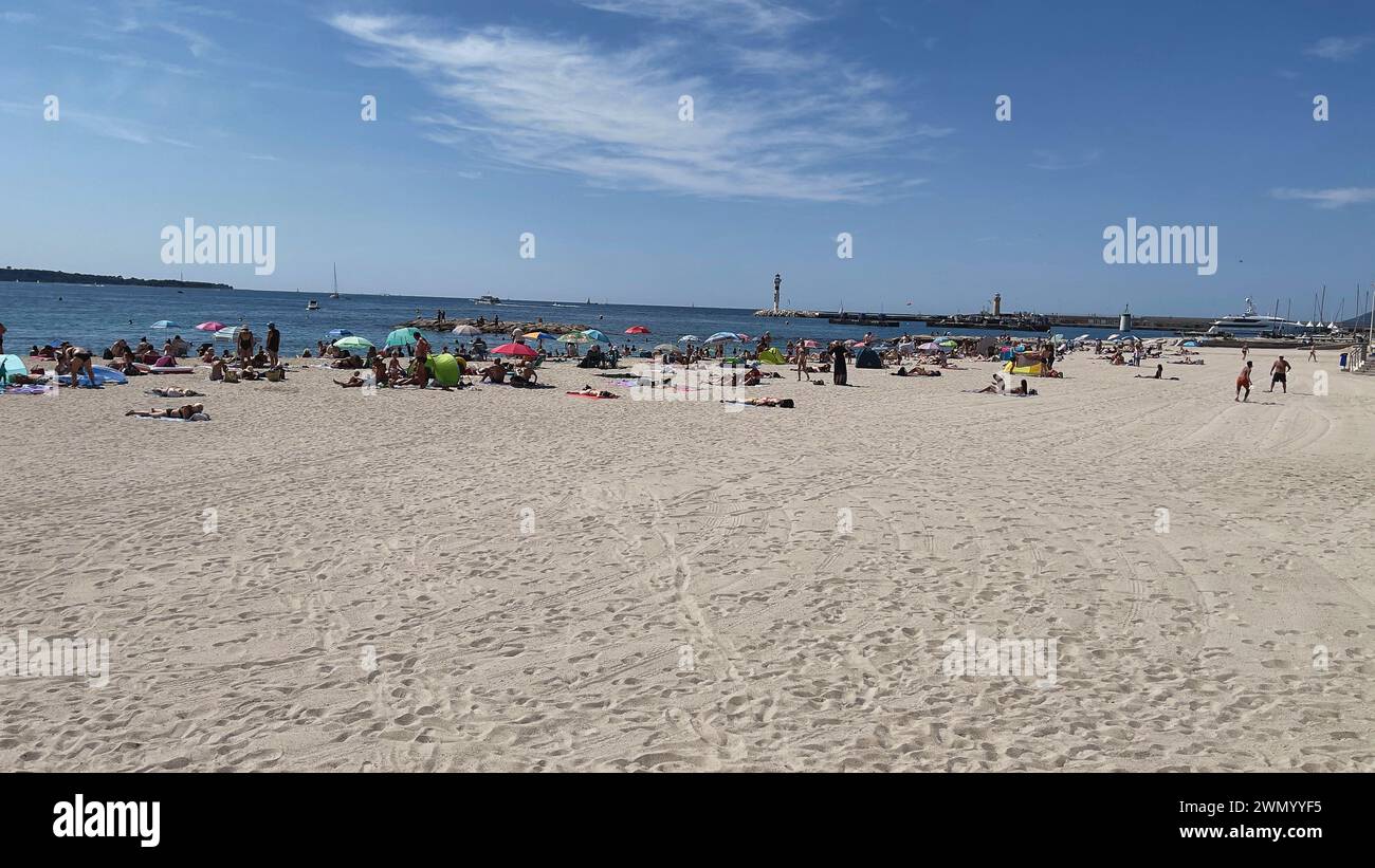 Cannes, France- August 3,2021: Crowd relaxing on the famous Plage des ...