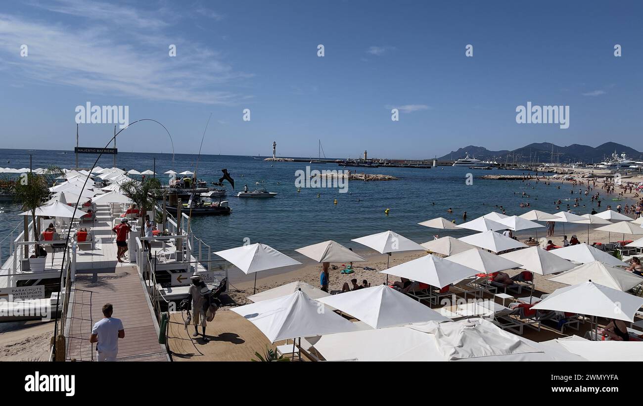 Cannes, France- August 3,2021: Crowd relaxing on the famous Plage des ...