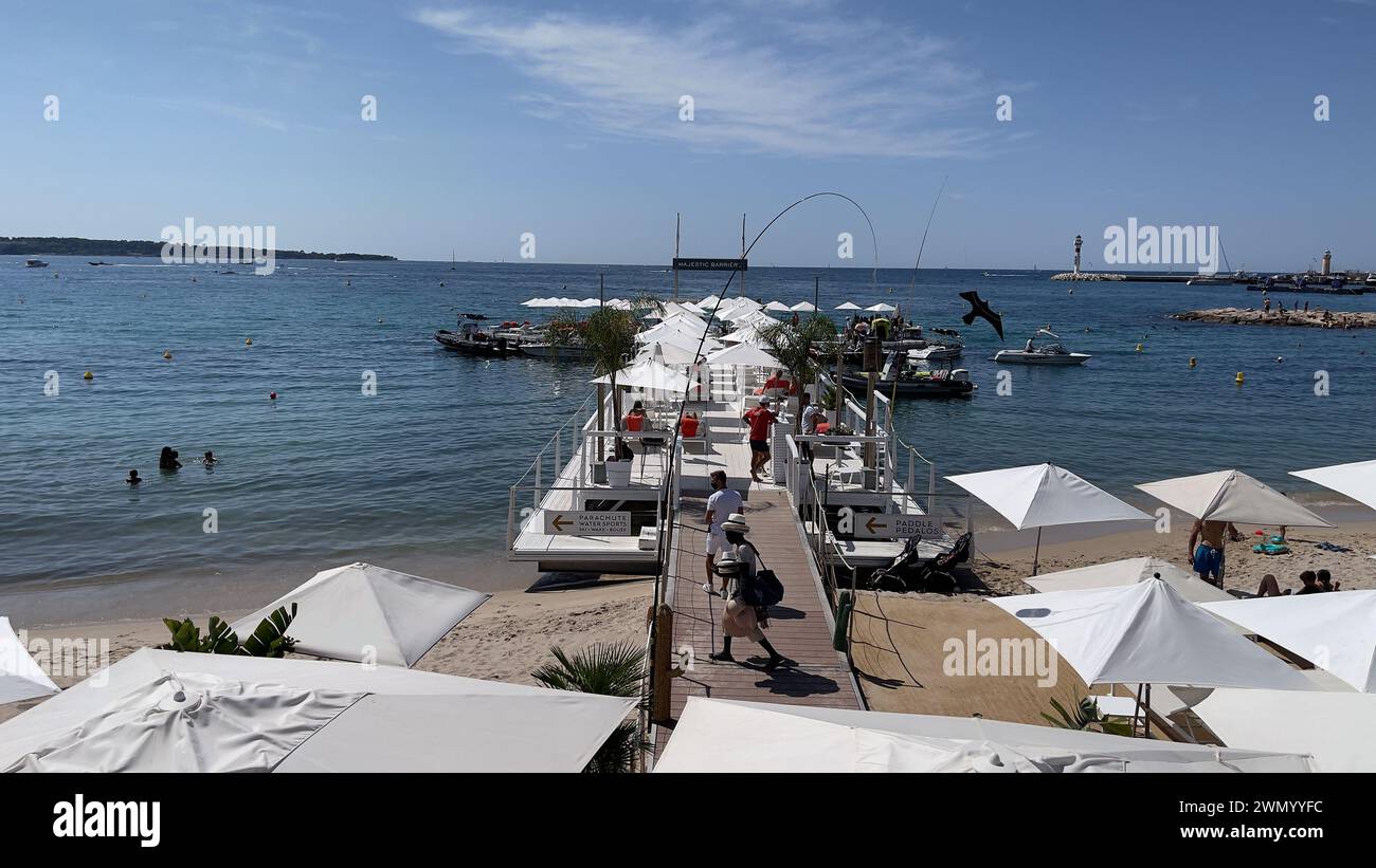 Cannes, France- August 3,2021: Crowd relaxing on the famous Plage des ...