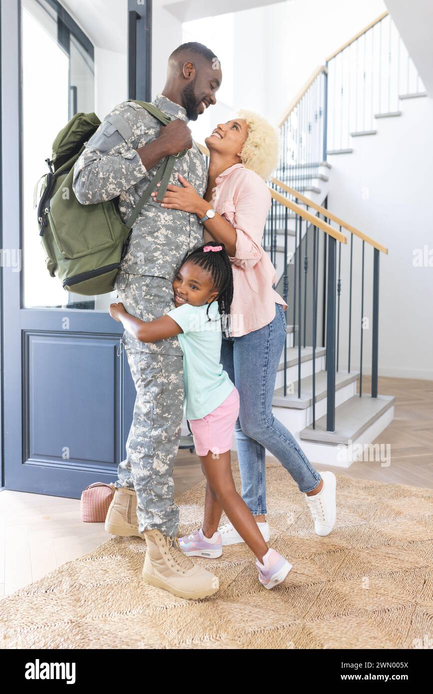 Military man reunites joyfully with family at home Stock Photo - Alamy Military man reunites joyfully with family at home Stock Photo - Alamy