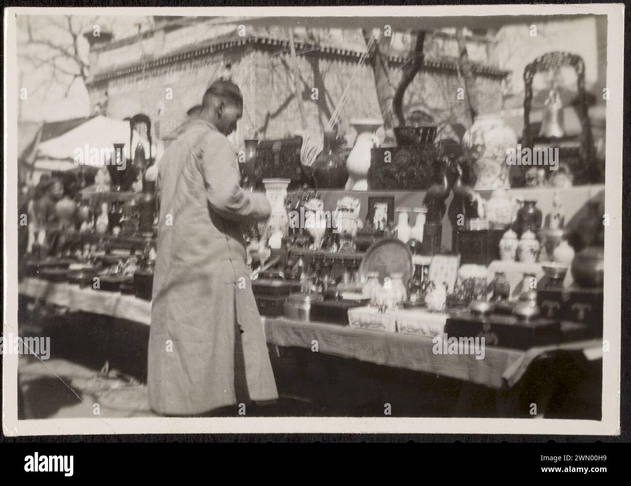 Man shopping at a street vendor. Man shopping at a street vendor Stock ...