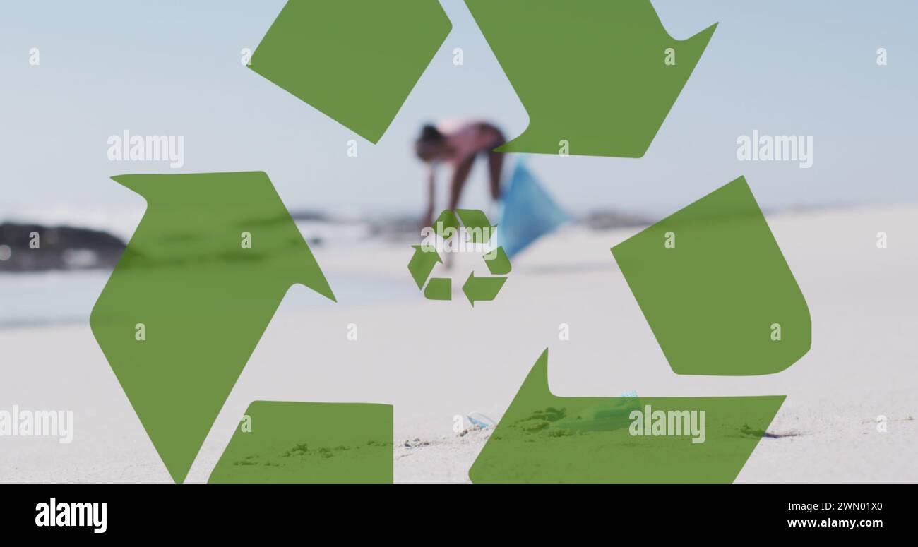 Image of recycling symbol over african american woman collecting waste ...