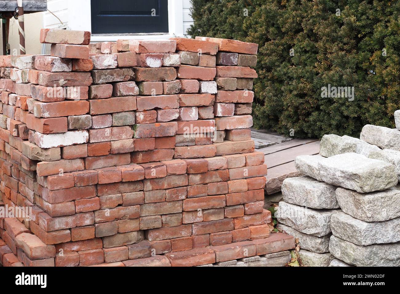 The bricks and stone are piled up at the construction site Stock Photo ...