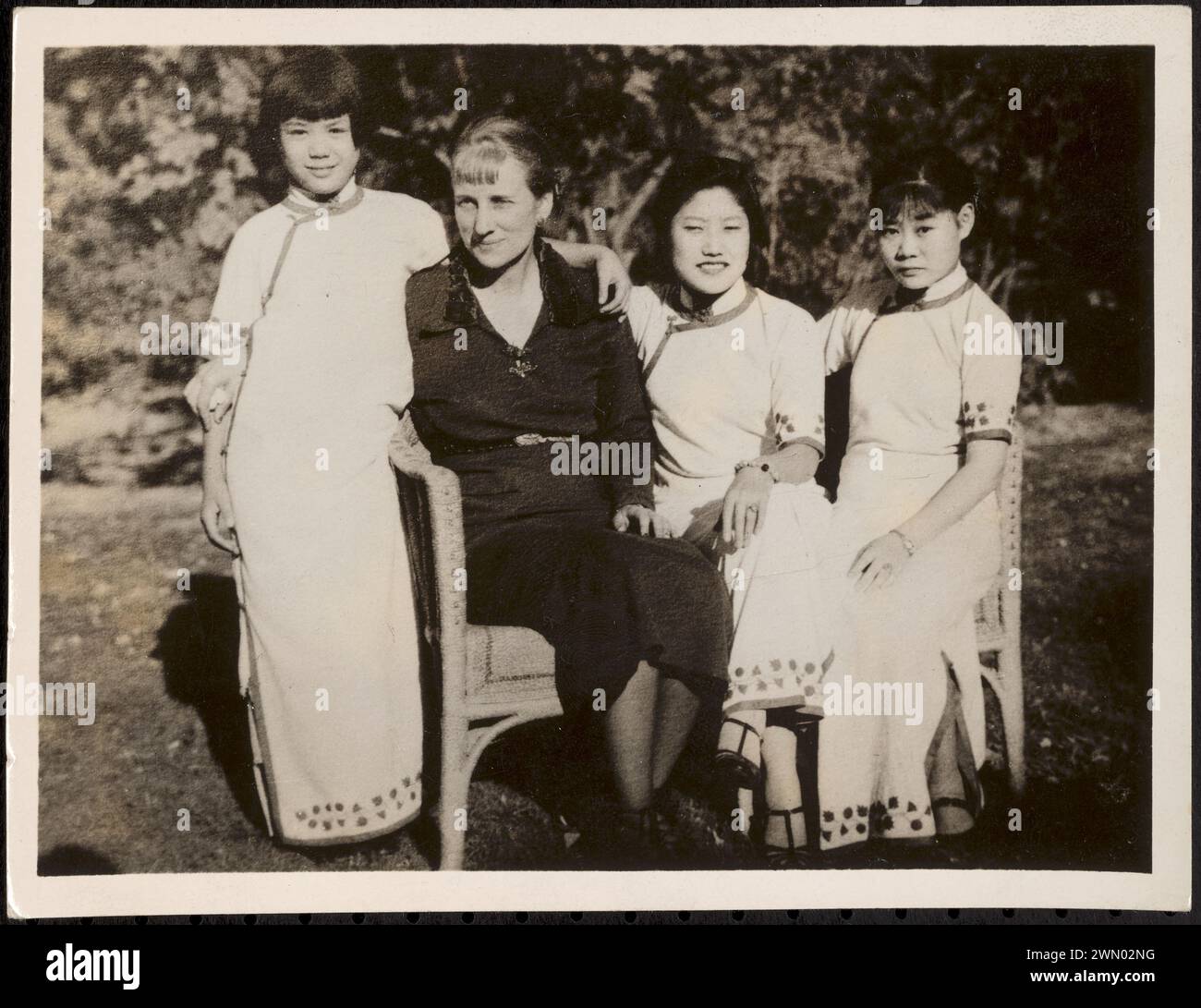 Miss Helen Buston and her adopted Chinese daughters. Miss Helen Buston ...