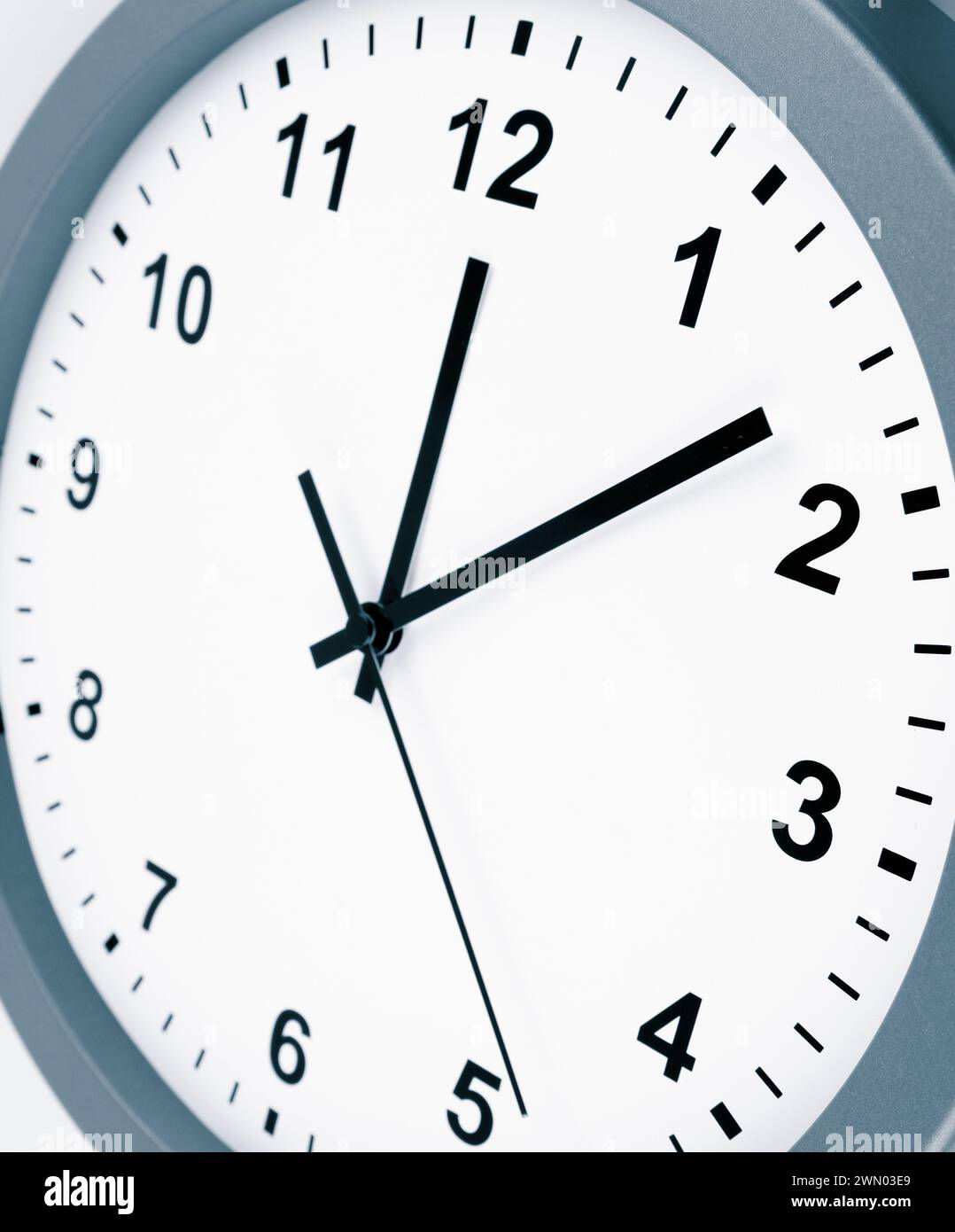 Close-up of hands on clock face Stock Photo - Alamy