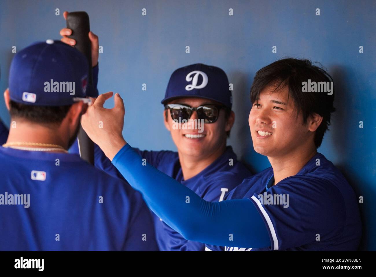 Los Angeles Dodgers relief pitcher Yoshinobu Yamamoto, center, and ...