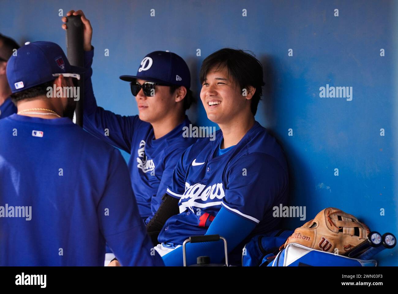 Los Angeles Dodgers relief pitcher Yoshinobu Yamamoto, center, and ...