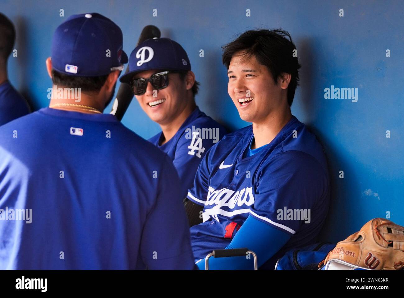 Los Angeles Dodgers relief pitcher Yoshinobu Yamamoto, center, and ...
