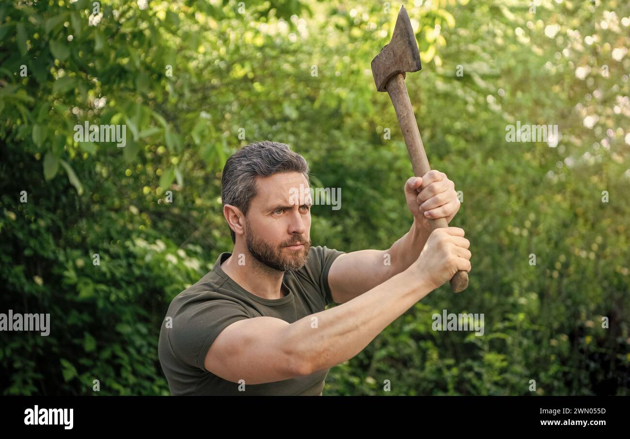 image of man hit with axe. man hit with axe. man hit with axe wearing ...