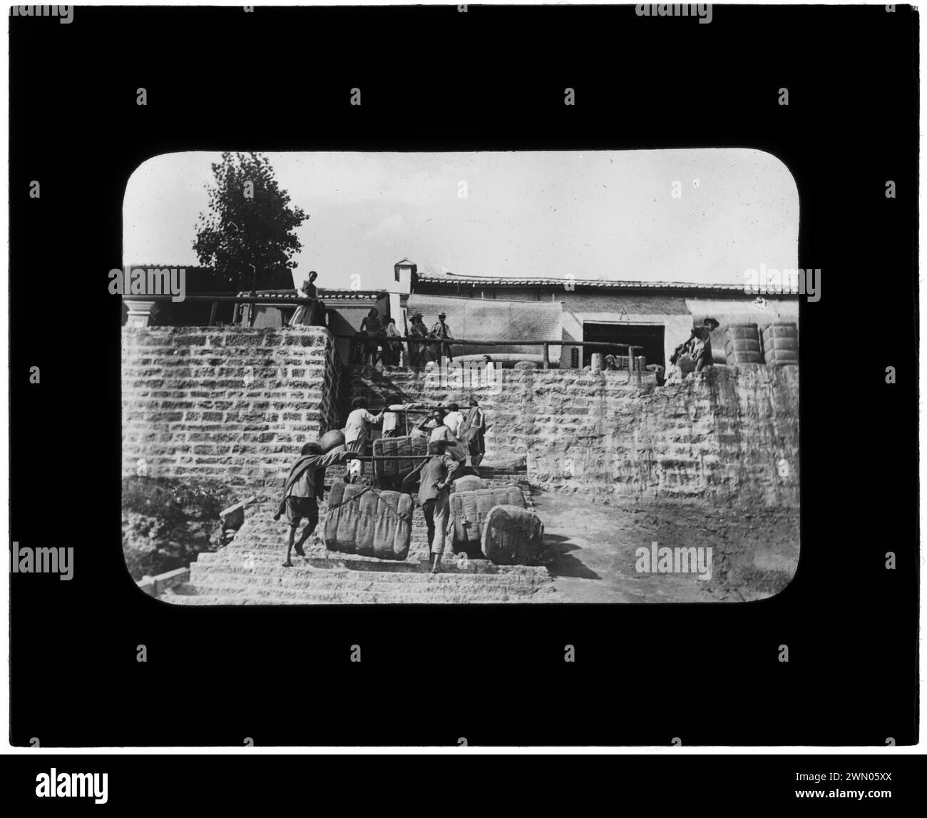 People carrying items. People carrying items Stock Photo - Alamy