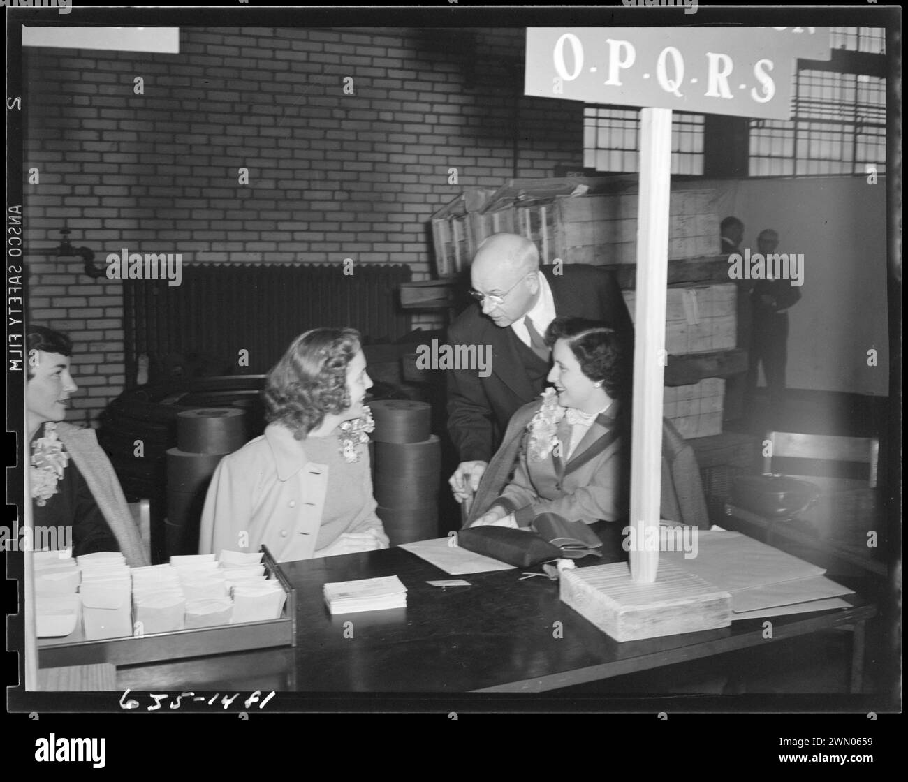 Women at registration table. Women at registration table Stock Photo ...