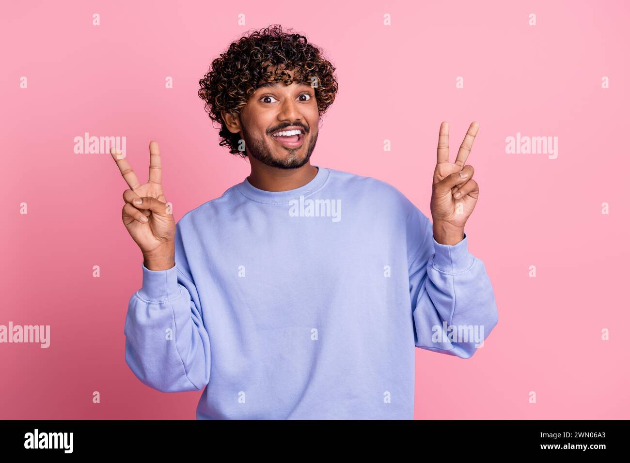 Photo of positive glad guy wear blue outfit two hands showing v-sign ...