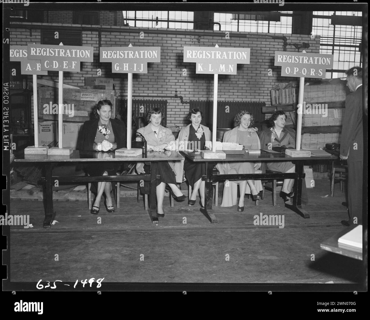 Women at registration table. Women at registration table Stock Photo ...