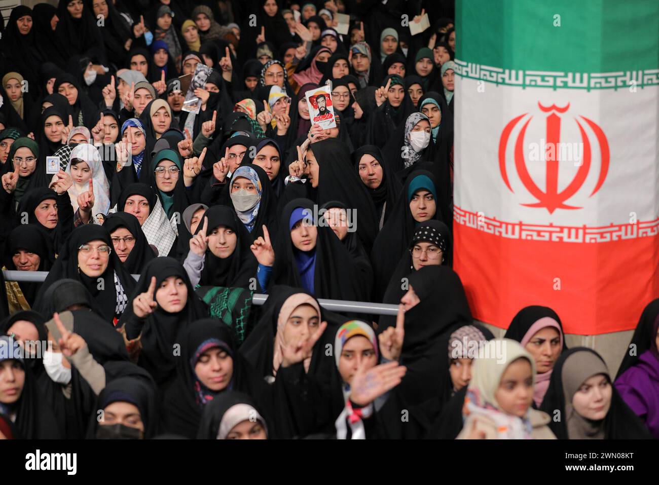 Tehran, Iran. 28th Feb, 2024. A group of young first-time voters women ...