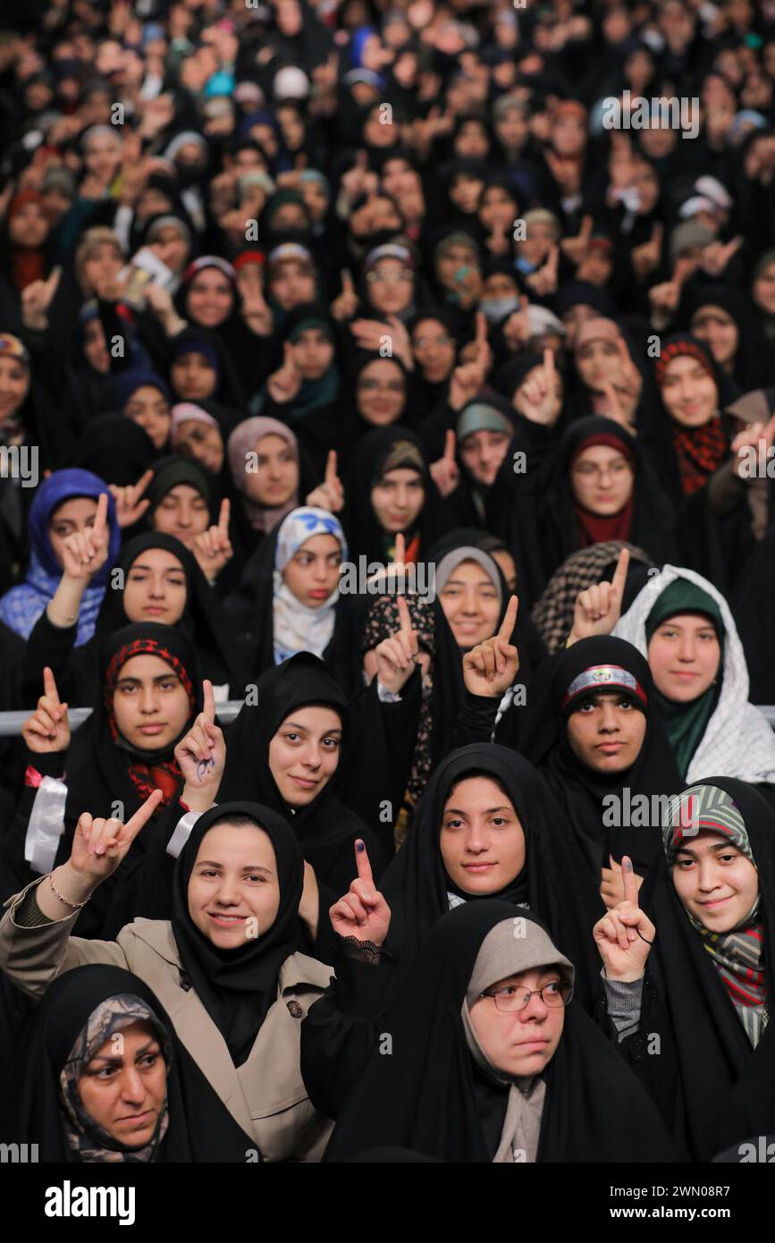 Tehran, Iran. 28th Feb, 2024. A group of young first-time voters women ...