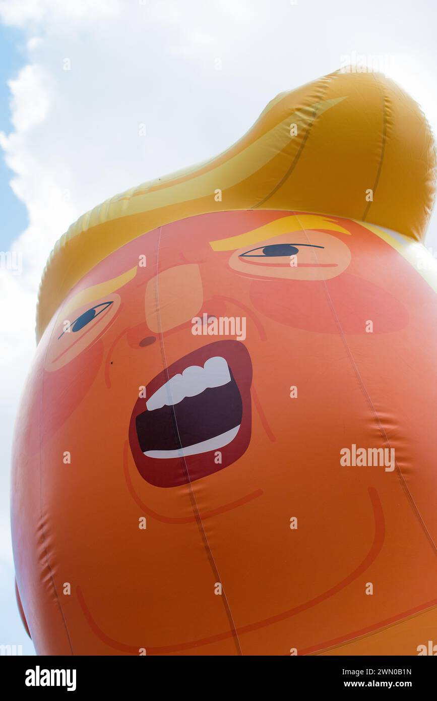 The orange Baby Trump blimp being paraded around Parliament Square ...
