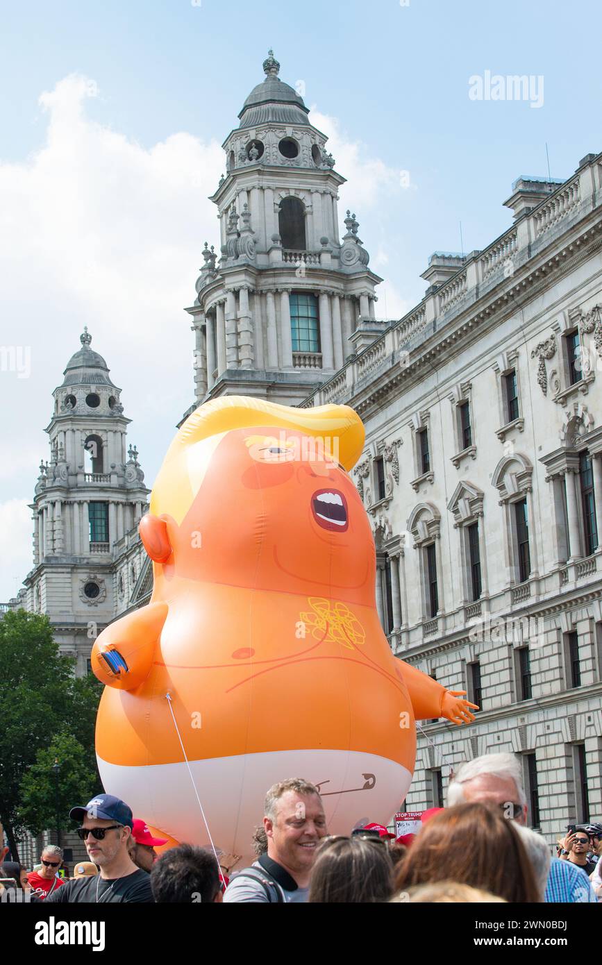 The orange Baby Trump blimp being paraded around Parliament Square ...
