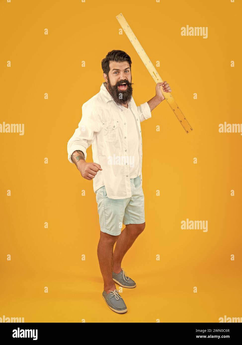 Angry teacher and ruler hi-res stock photography and images - Alamy