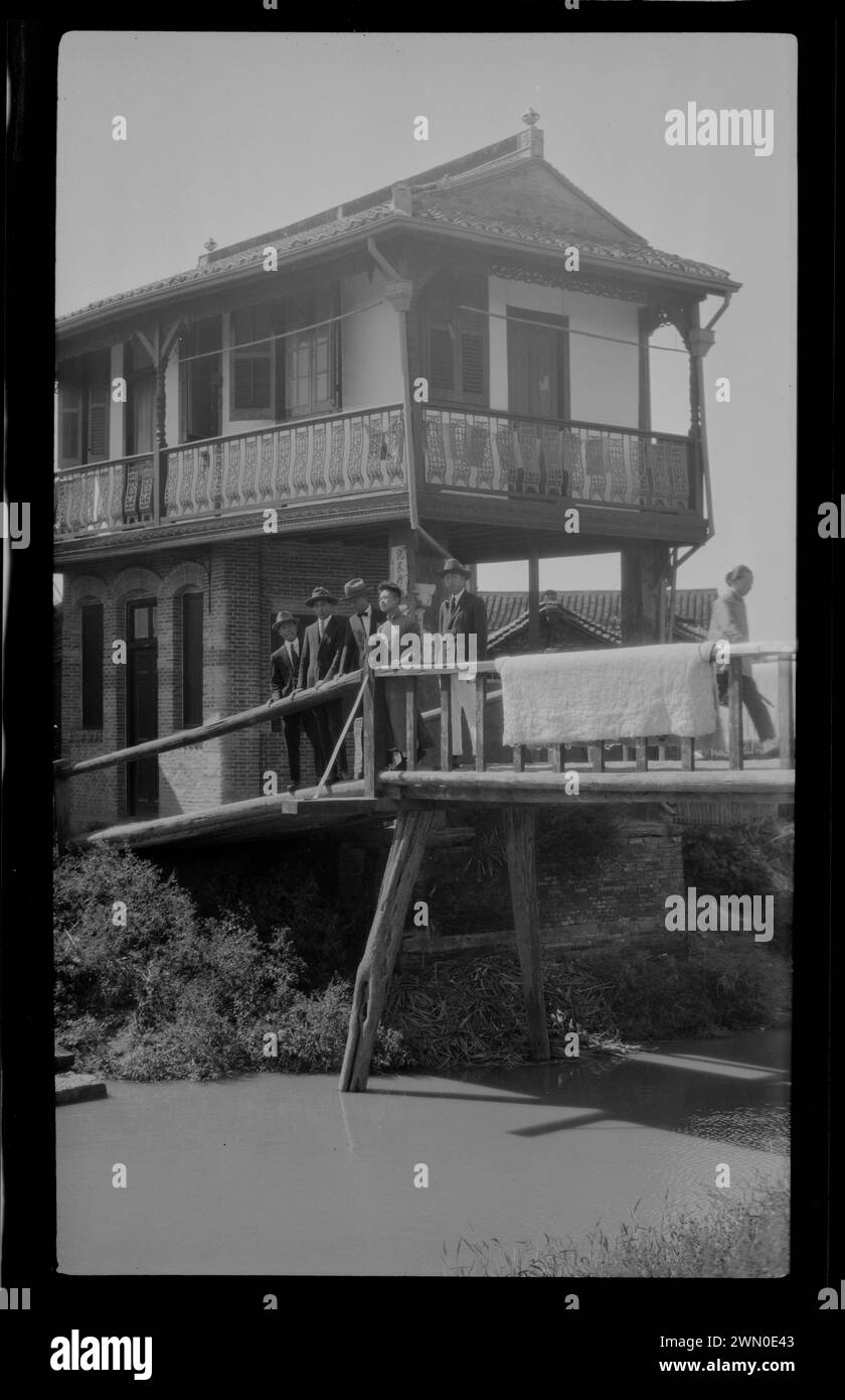 Men in western suits on bridge. Men in western suits on bridge Stock ...