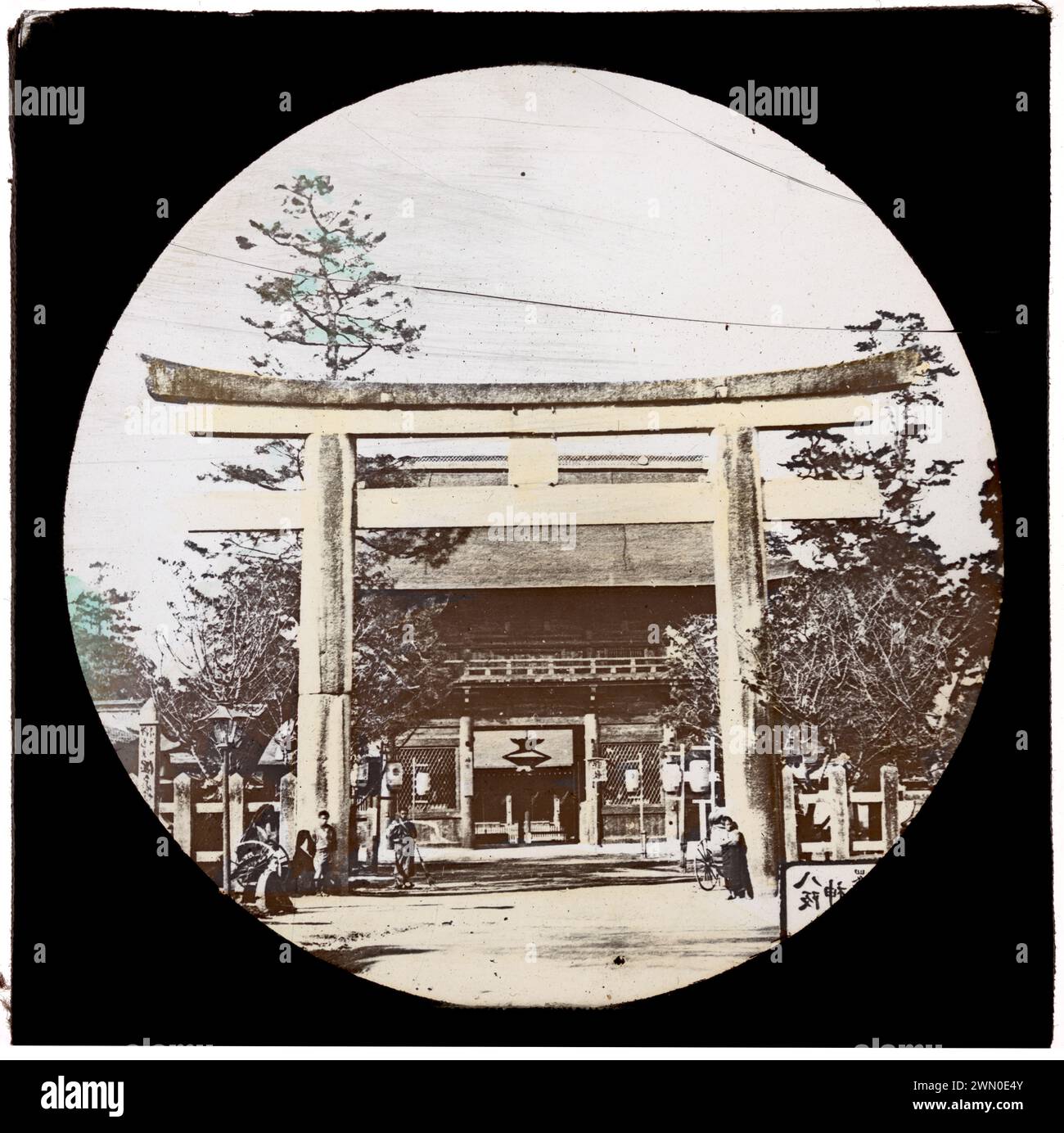 People standing outside of a temple. People standing outside of a ...