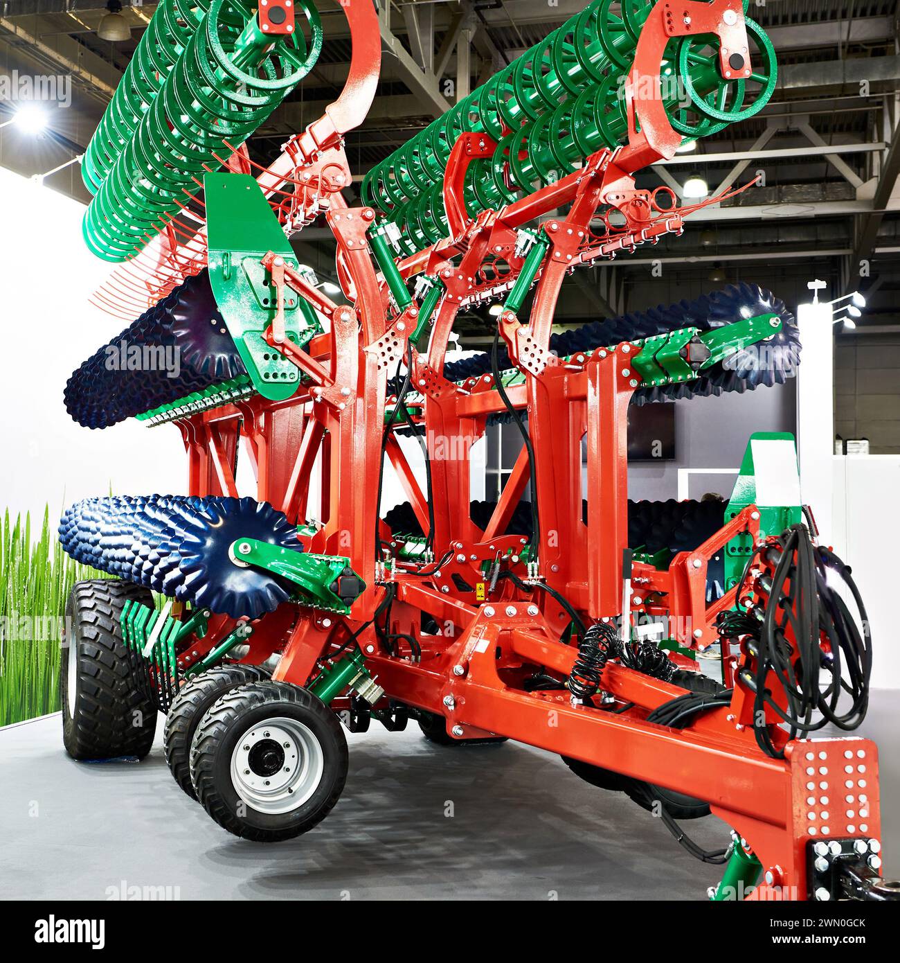 Trailed in-line disc harrow at an agricultural exhibition Stock Photo ...