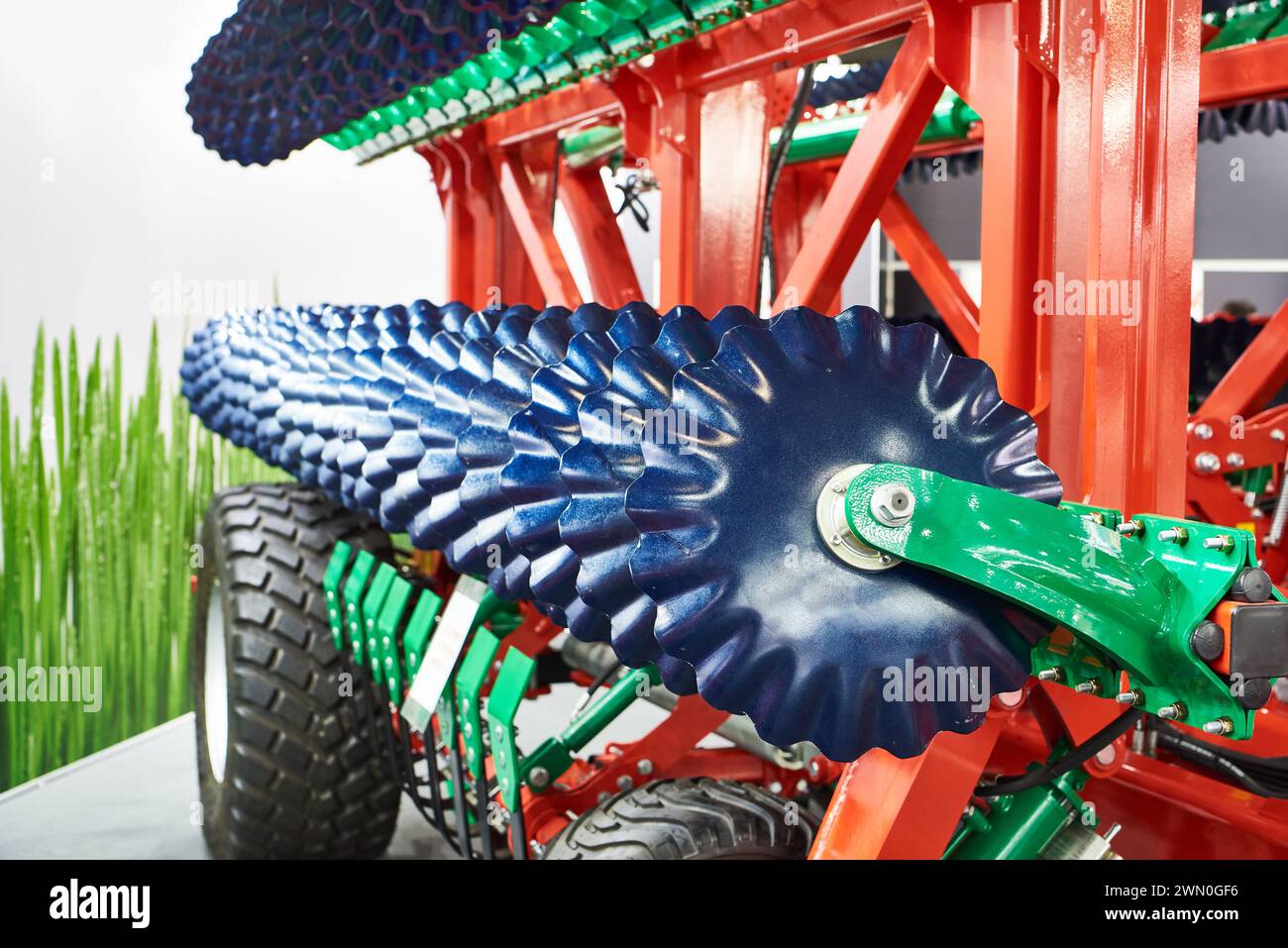 Trailed in-line disc harrow at an agricultural exhibition Stock Photo ...